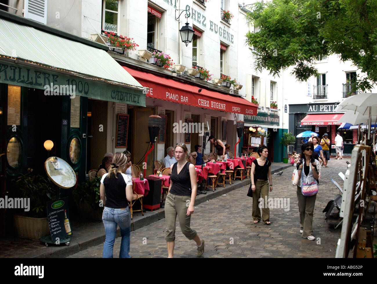 Shops and cafes line the streets near the central market in Montmarte ...