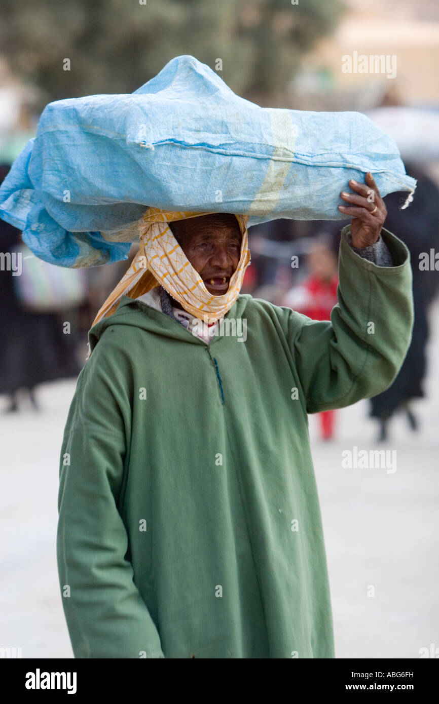 Man carrying sack on head hi-res stock photography and images - Alamy