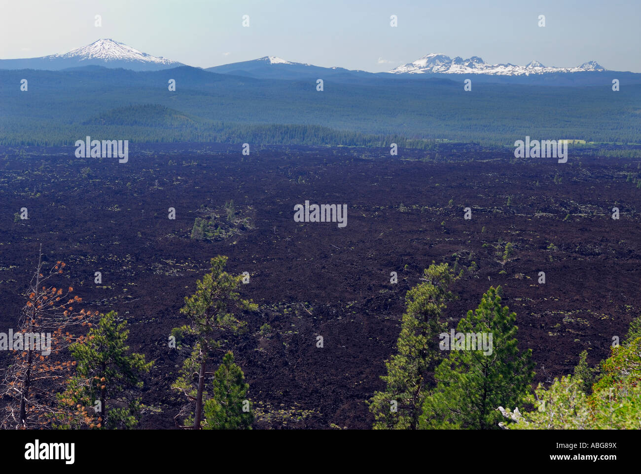 Lava Land volcanic monument with Broken Top and Mount Bachelor Stock ...