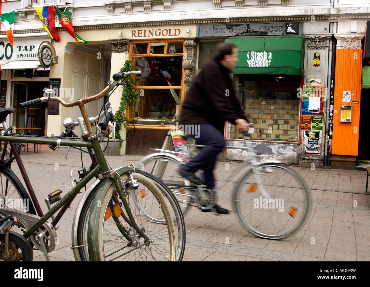 People ride bicycles around the city in Hamburg Germany Stock Photo - Alamy