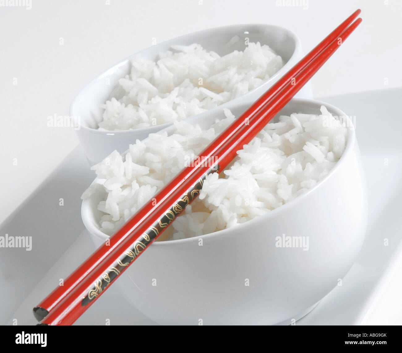 Rice with chopsticks Stock Photo - Alamy
