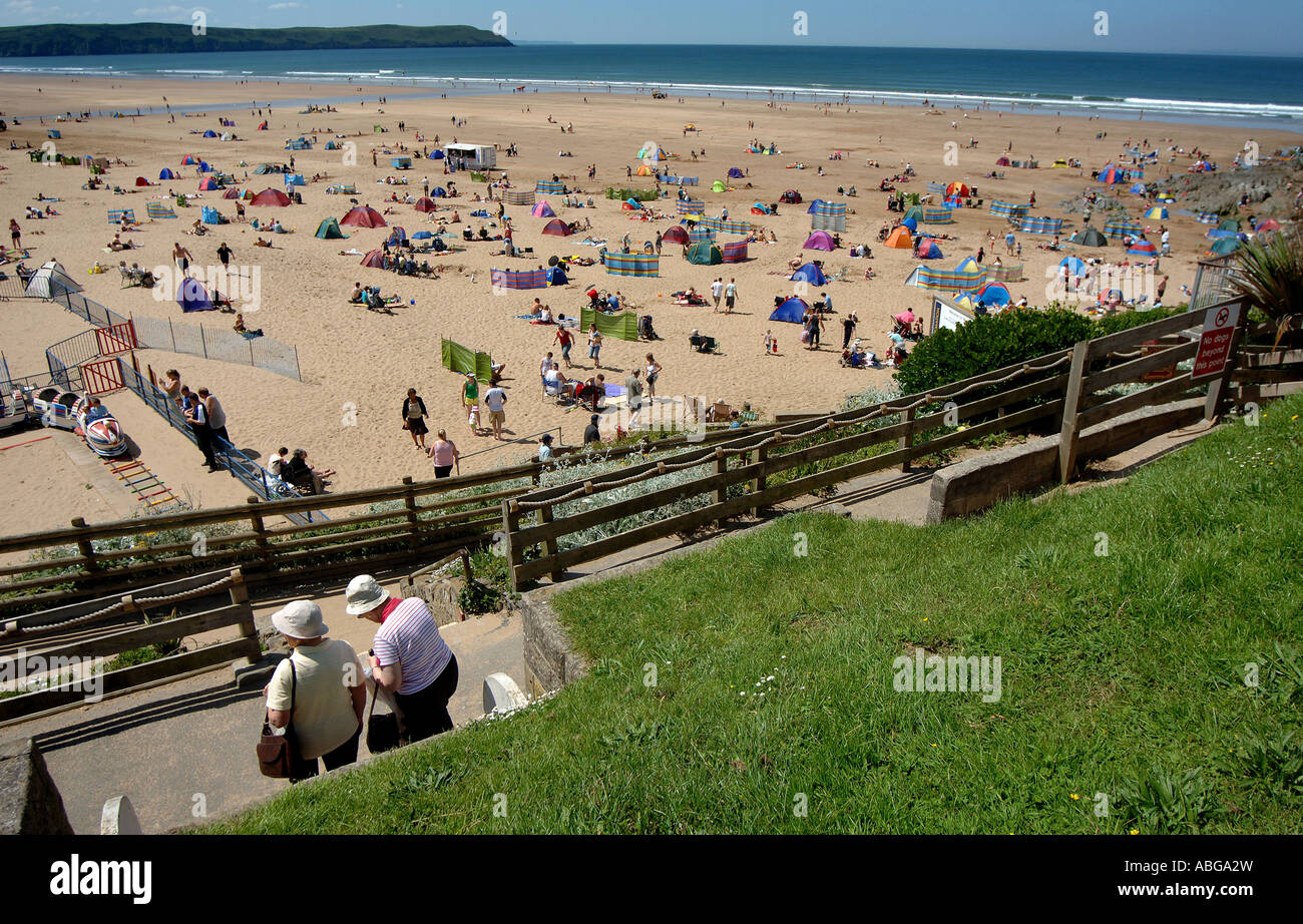 A busy beach scene full of holiday makers at Woolacombe bay, North ...