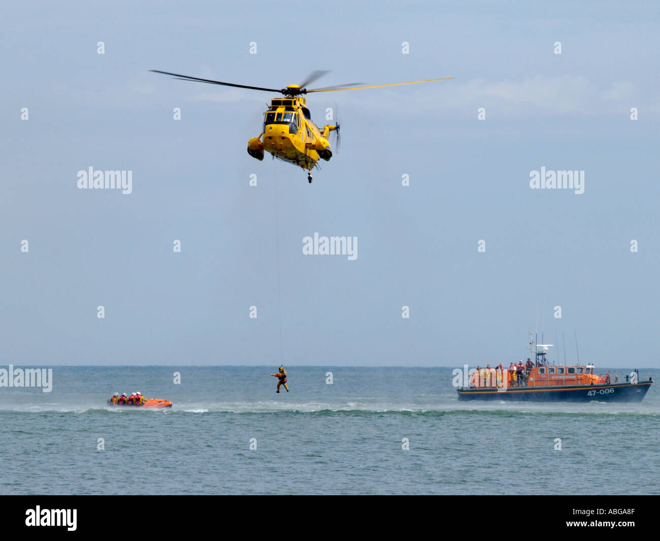 RNLI INSHORE LIFE BOAT LIFEBOAT IN EXERCISE WITH RAF RESCUE HELICOPTER ...