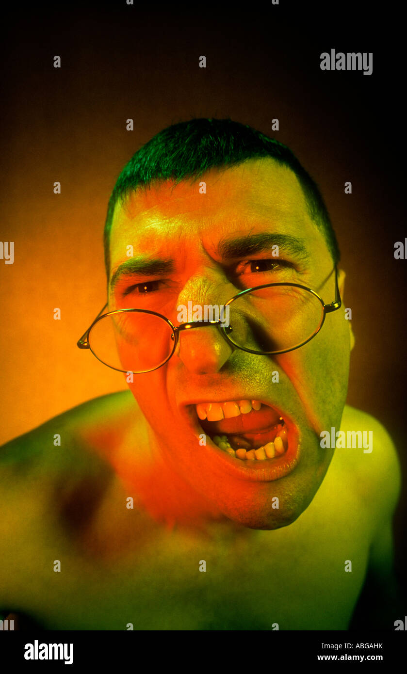 MAN AGRESSIVE EXPRESSION PORTRAIT Stock Photo - Alamy