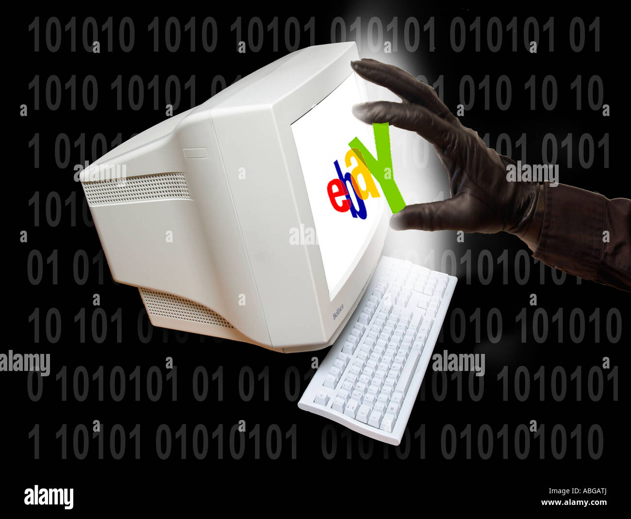 Hand with black glove reaches into a computer Stock Photo - Alamy