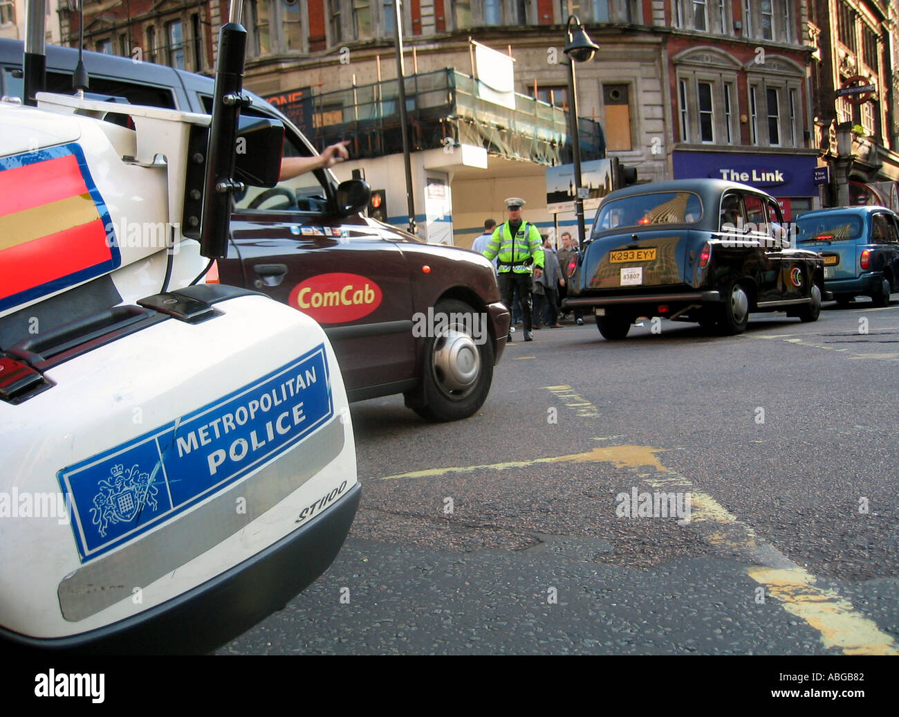 Police officer directing the bussy traffic in central london Stock ...