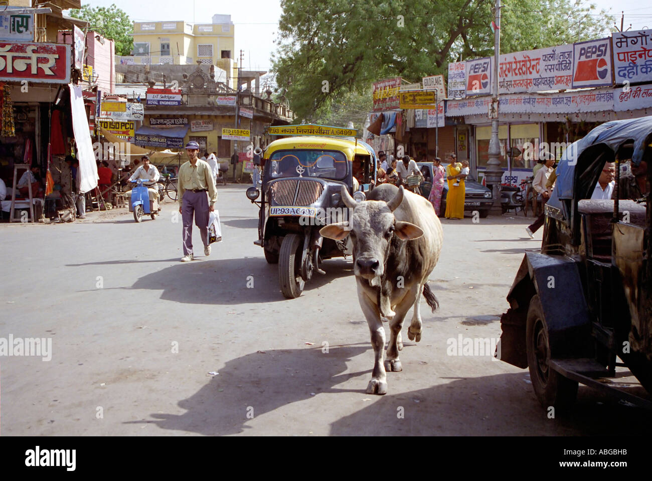 Gwalior Northern India typical street scene with motorised auto ...