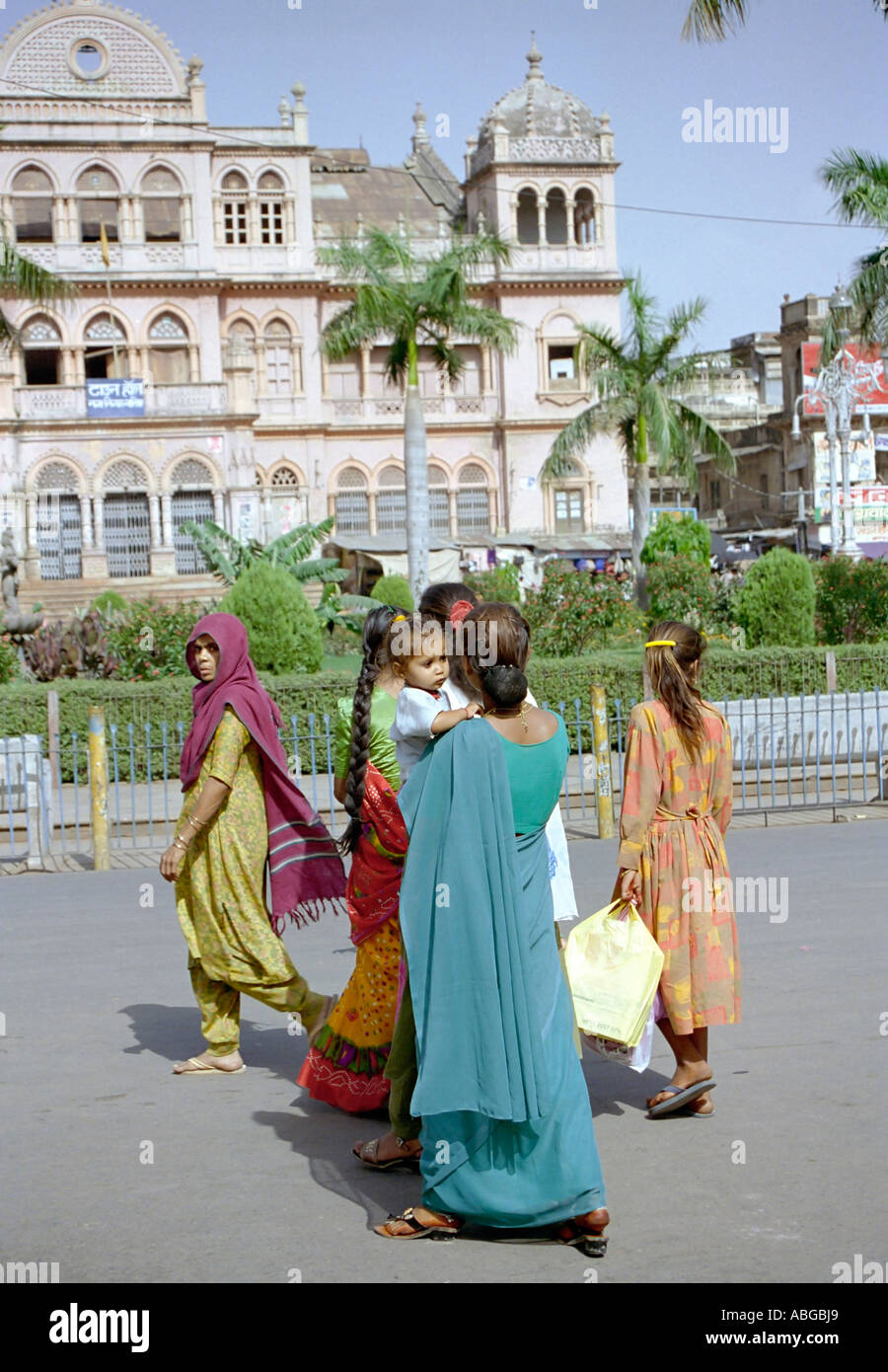 Typical street scene women and baby walking in Gwalior Madhya Pradesh ...