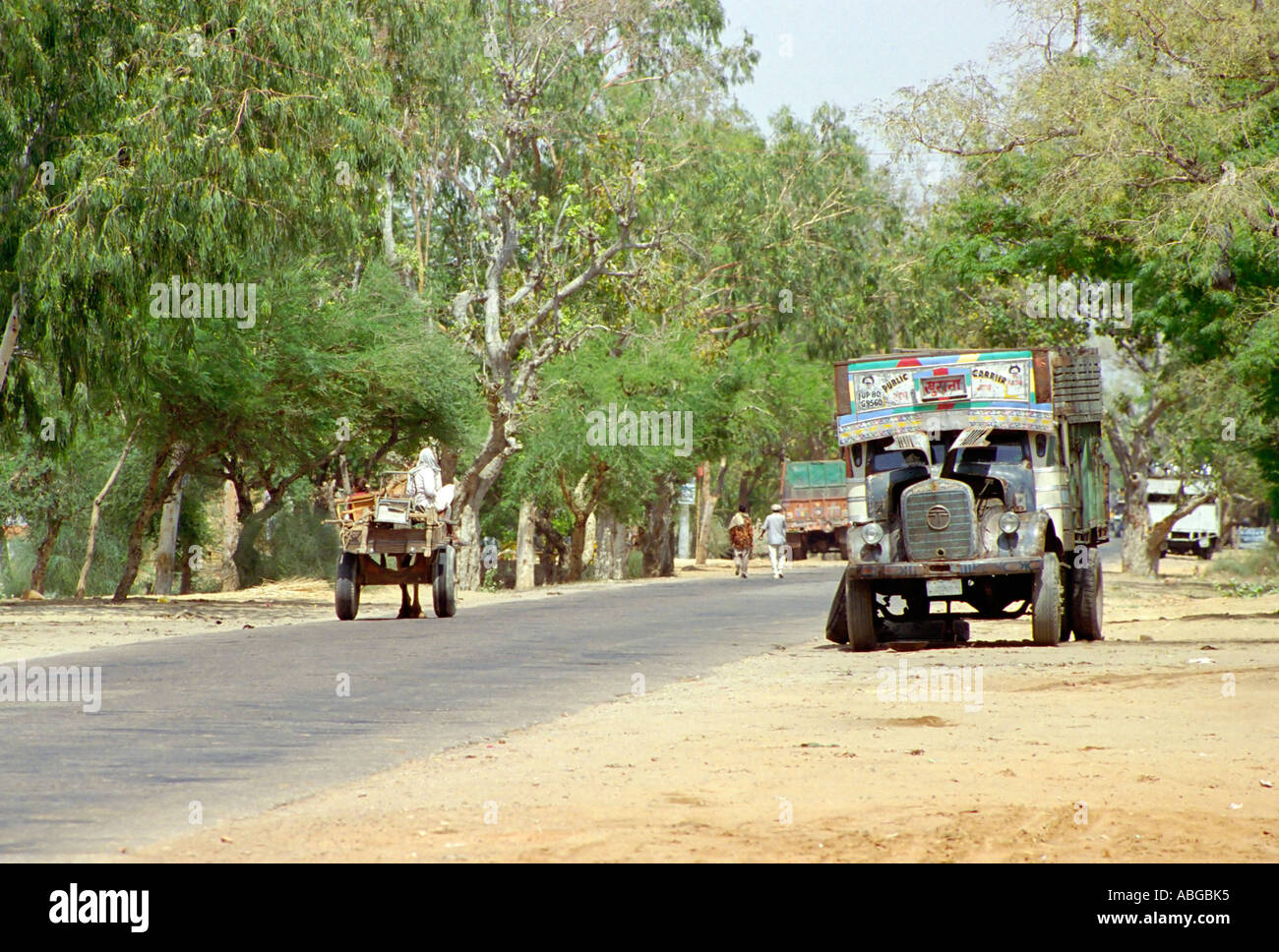 A rural road in Northern India South Asia with lorry and cart Stock ...