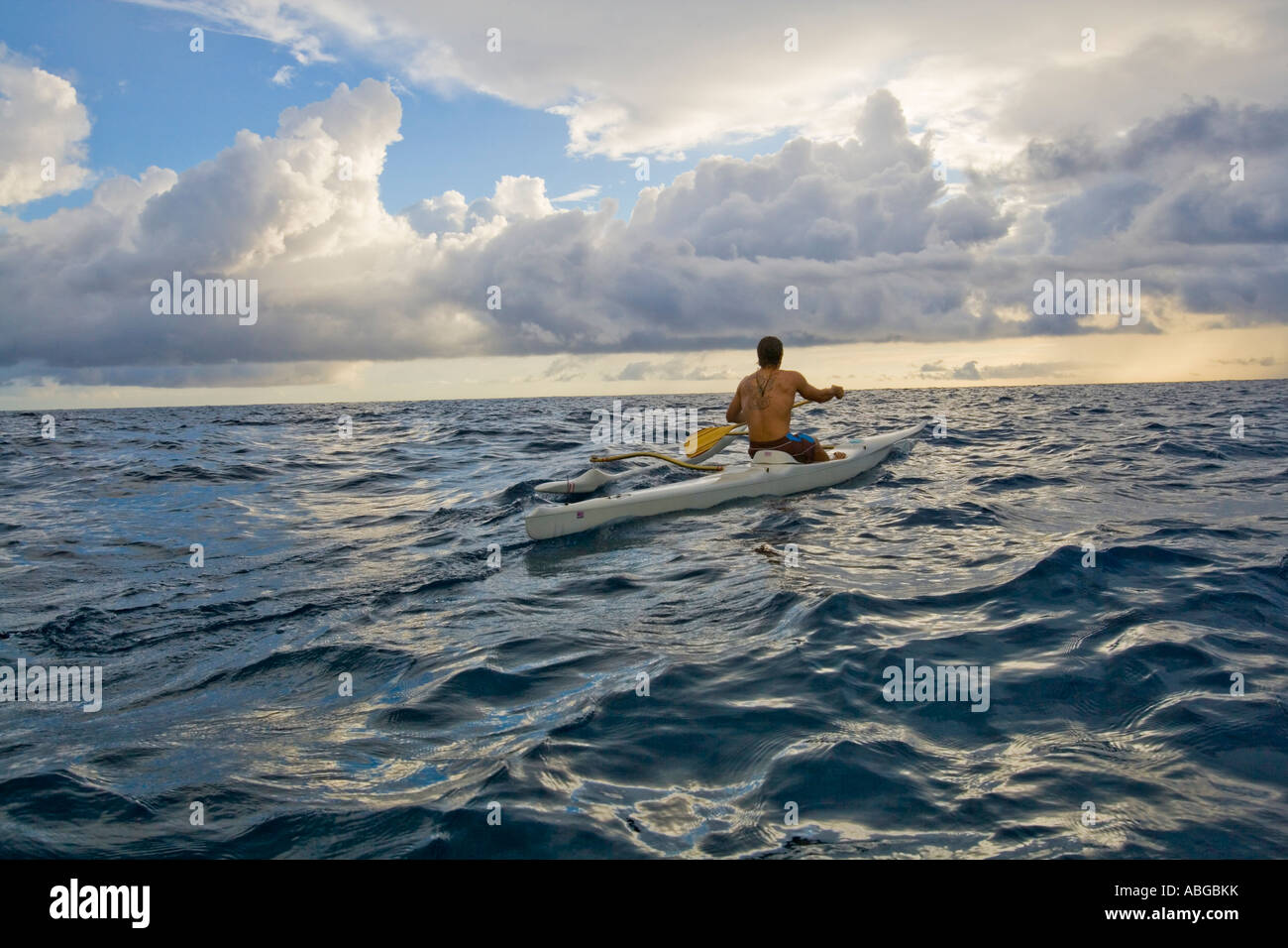 One man canoe paddler near Makapuu at sunrise Manana Island in ...