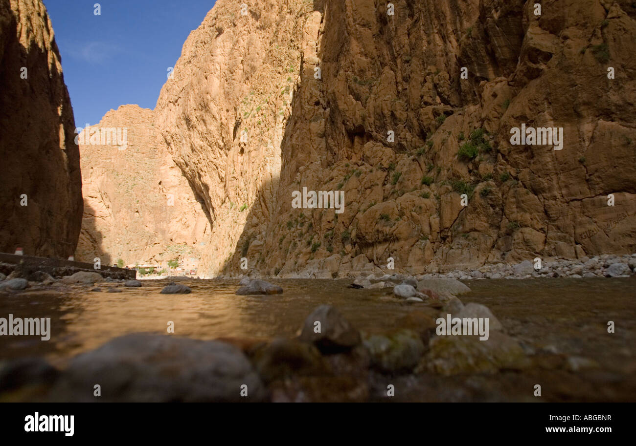 River runs beneath cliffs Gorges du Todra Morocco Stock Photo - Alamy