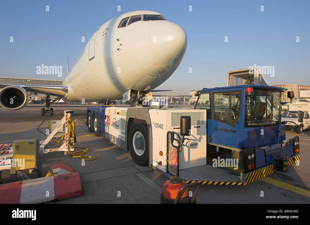 Goldhofer aeroplane tractor AST-1 X drags an airbus from Air Canda ...