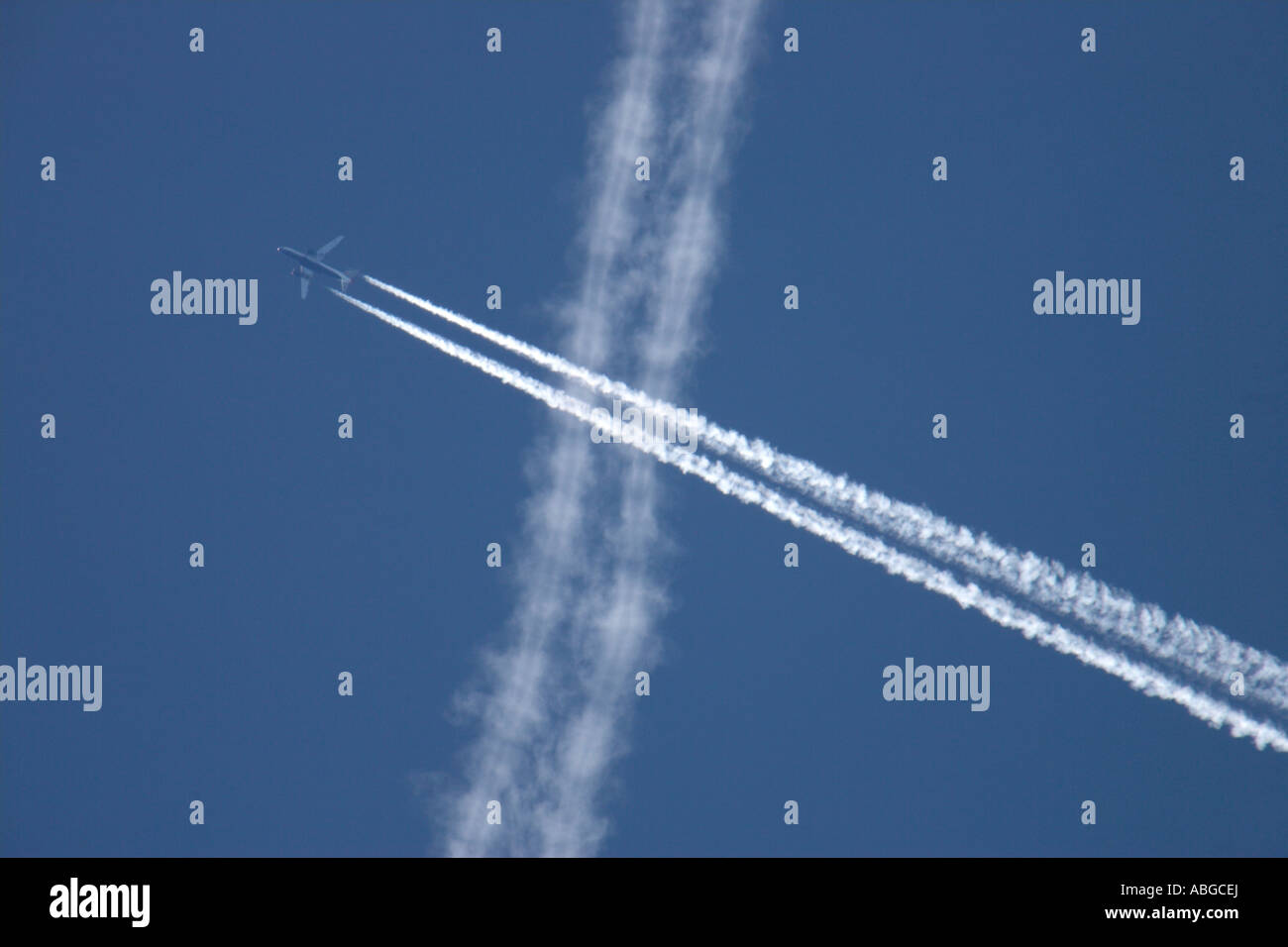 Vapour trails in the sky Stock Photo - Alamy