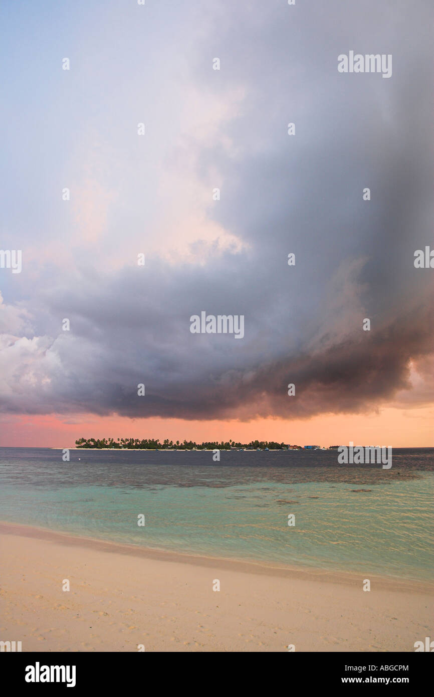 Thunderclouds above an island, Maledives Stock Photo - Alamy