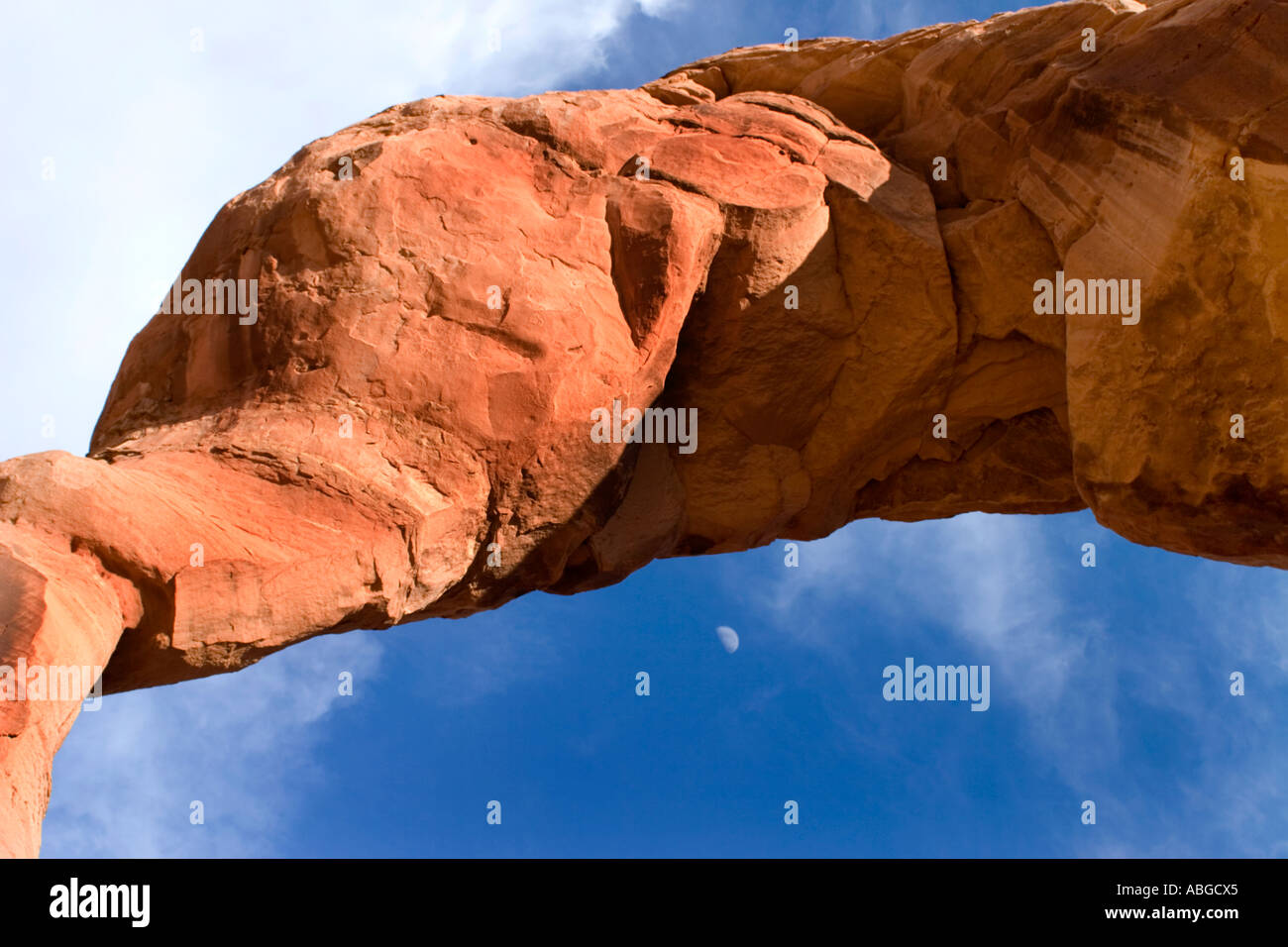 Arches Delicate Arch moon looking up Stock Photo - Alamy