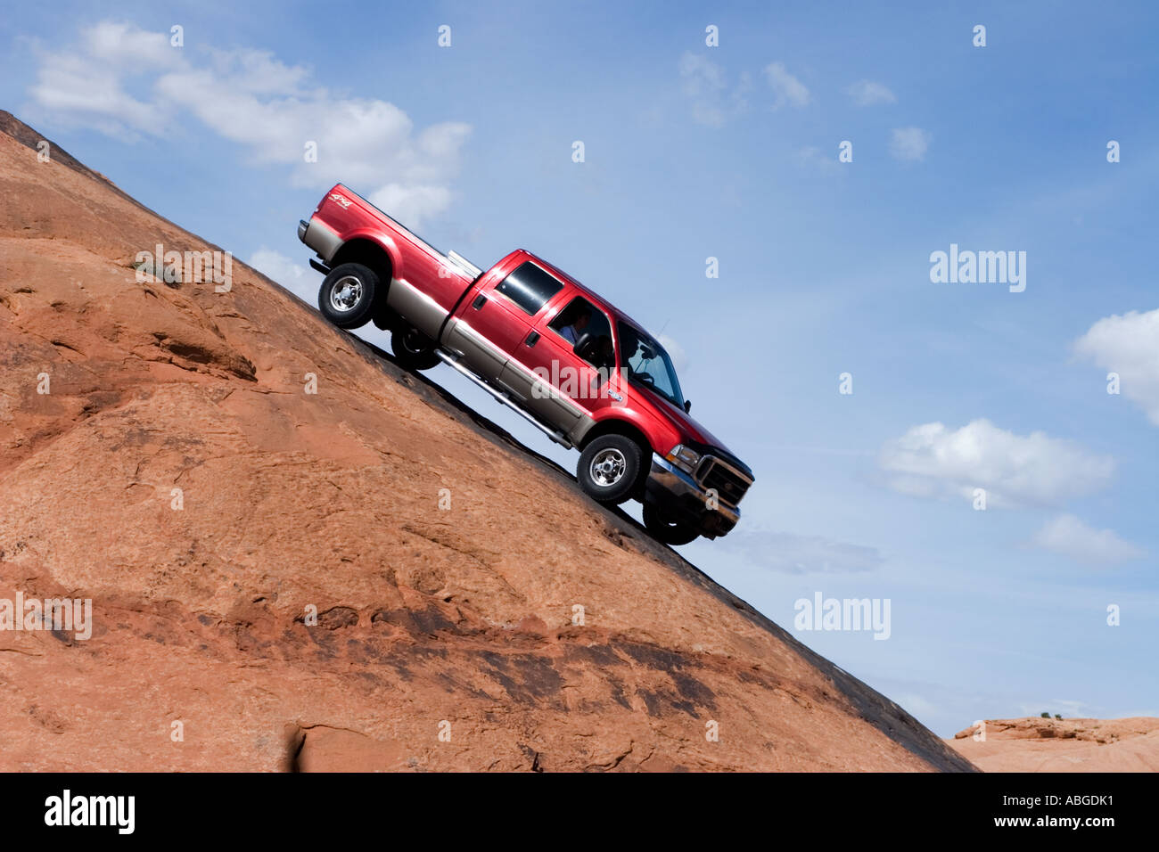 Ford truck on rock climbing down Slick rock Moab Utah Stock Photo - Alamy