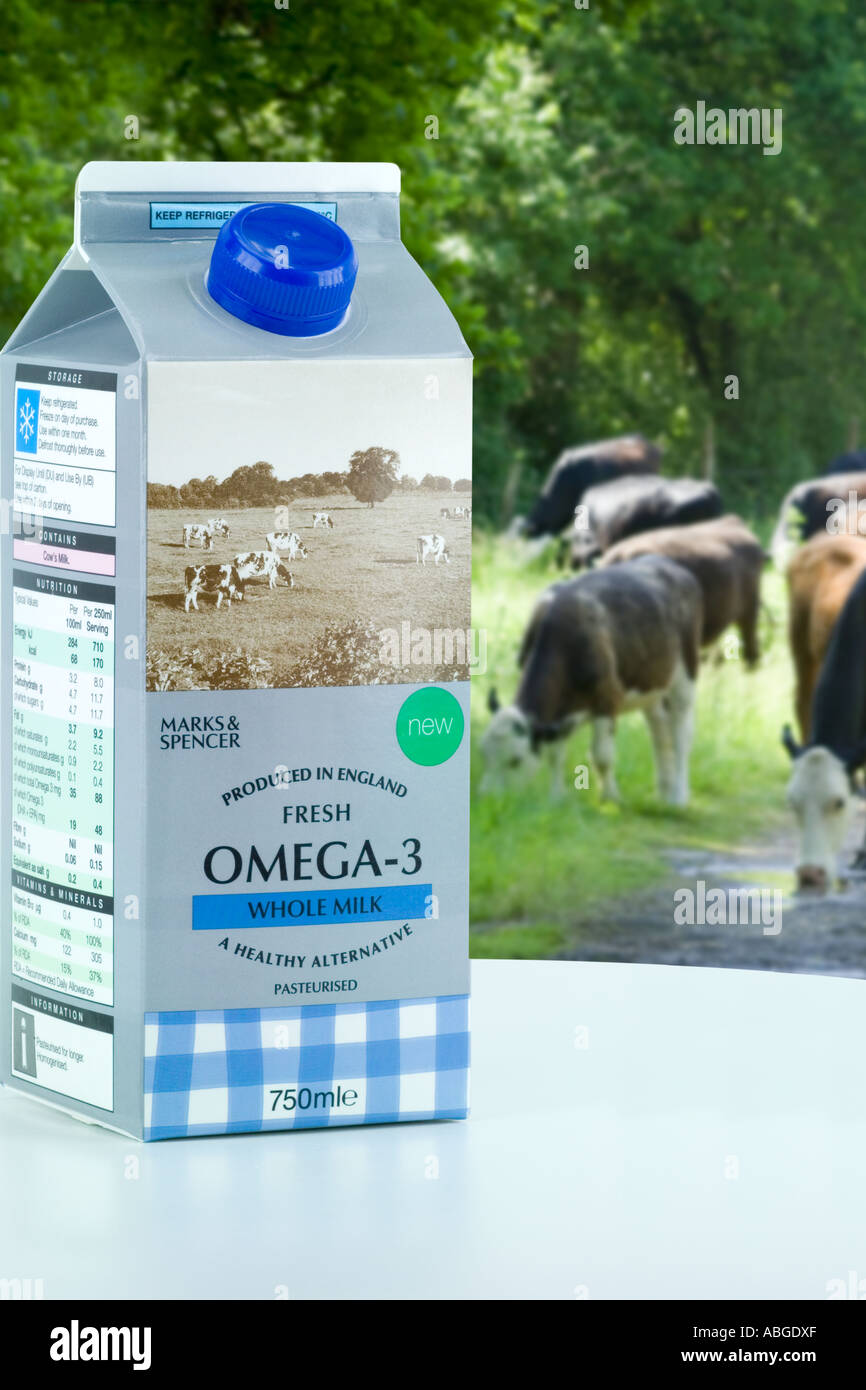 Carton of Milk fortified with omega-3 fish oils with cows in background ...