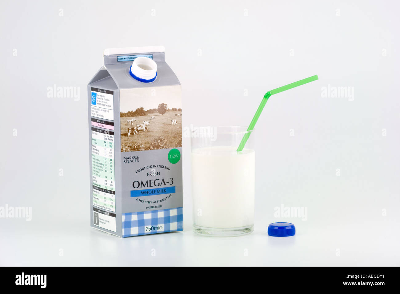 Carton and glass of Milk fortified with omega-3 fish oils Stock Photo ...