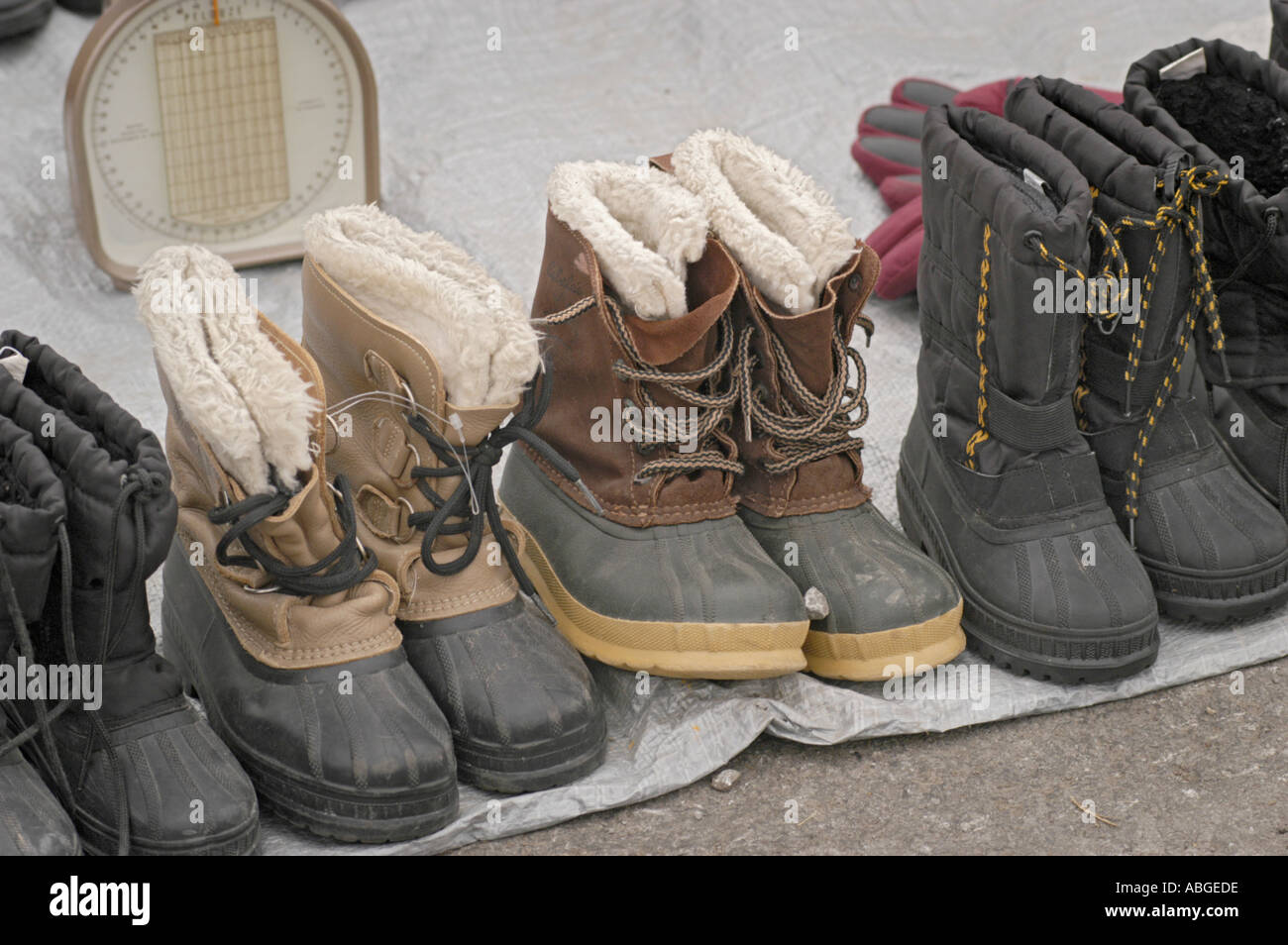 Boots for sale at Amish Flea Market Tag Sale Boot Sale Stock Photo - Alamy