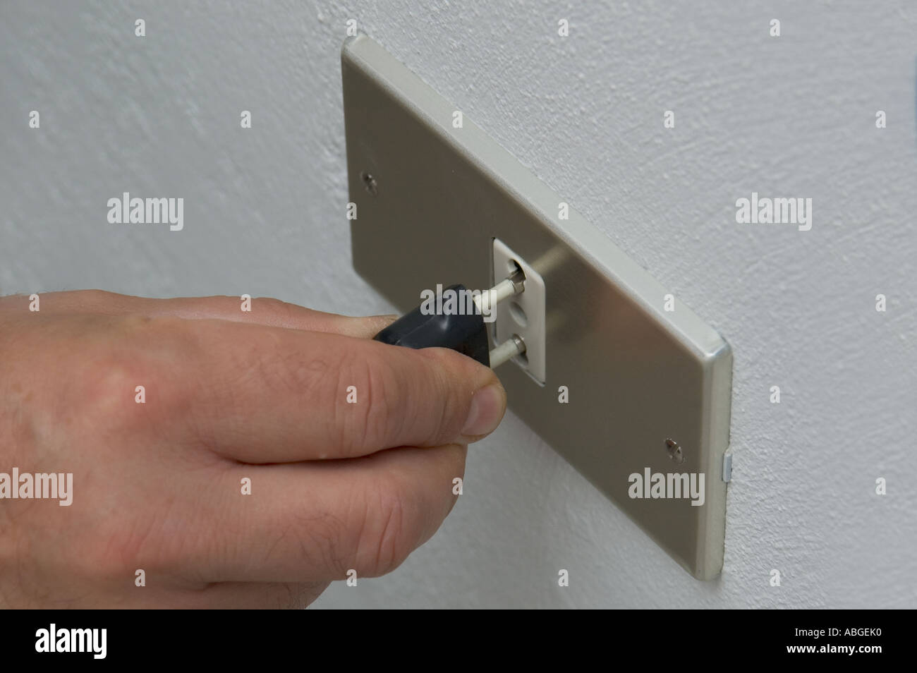 plug in the wall Stock Photo - Alamy