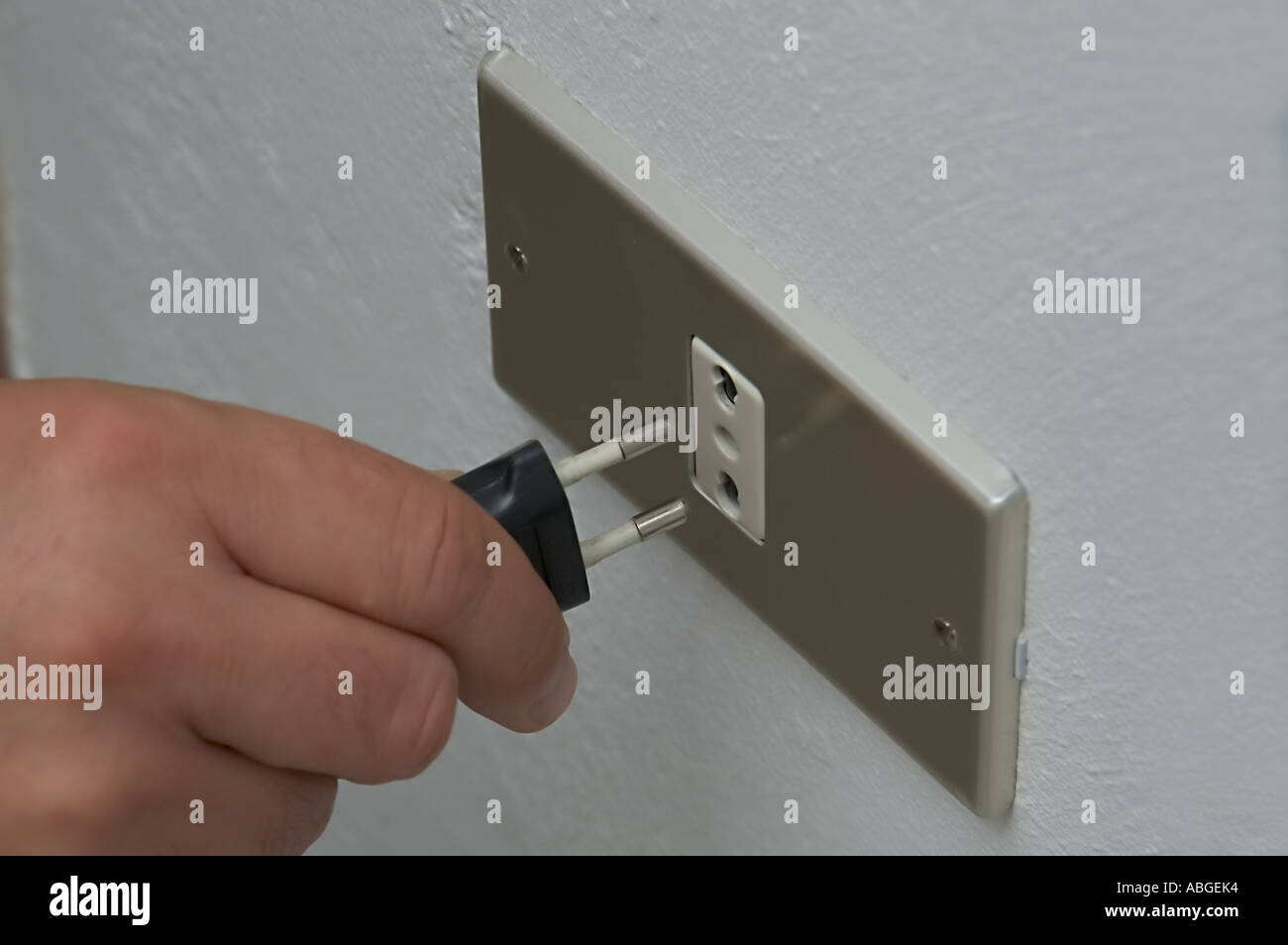 plug in the wall Stock Photo - Alamy