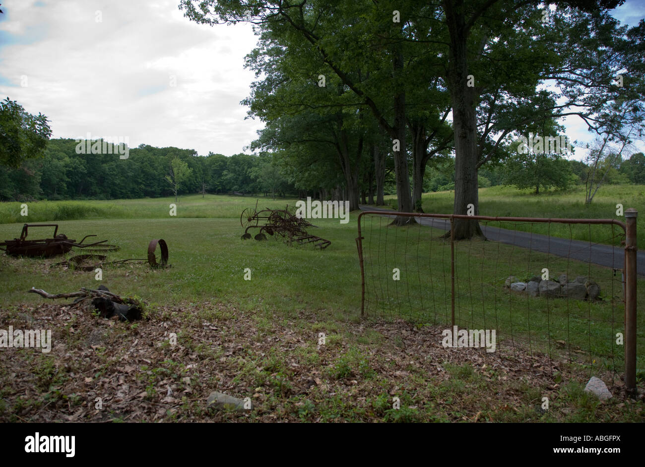 Old farm machinery in a field Stock Photo - Alamy