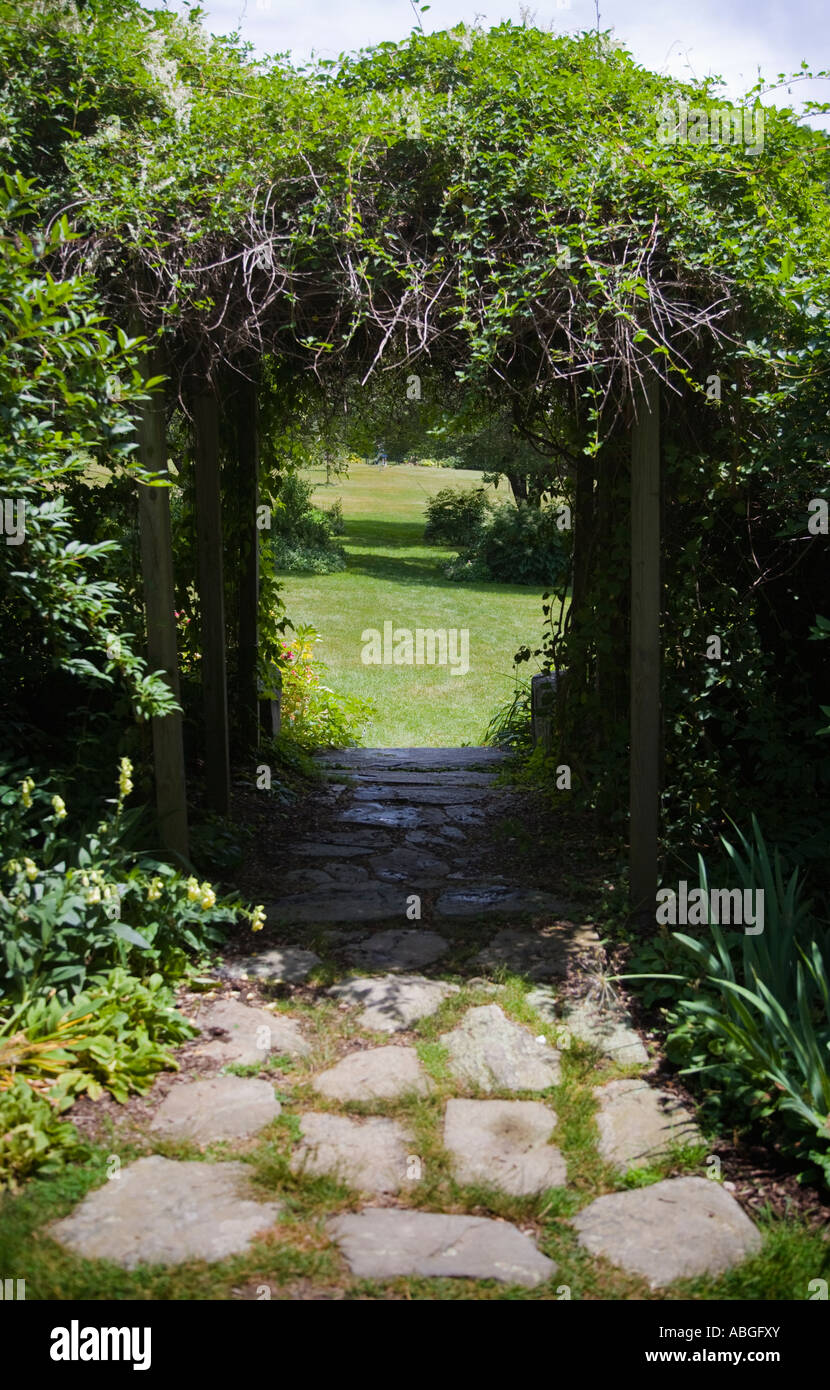 Path leading to the entrance to a garden Stock Photo - Alamy