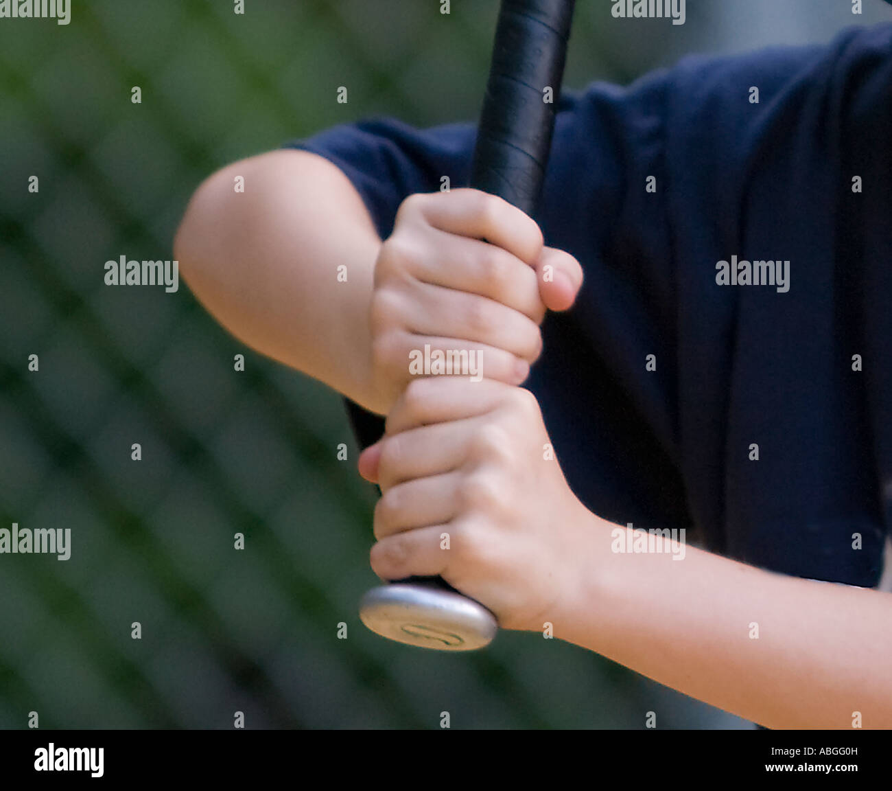 Hand Holding Softball Bat