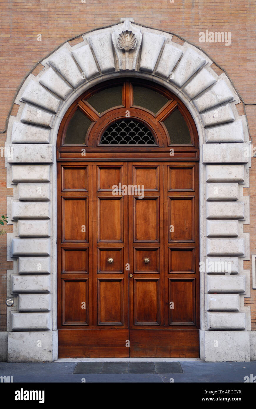 Classic door stonework in Rome Italy Stock Photo - Alamy