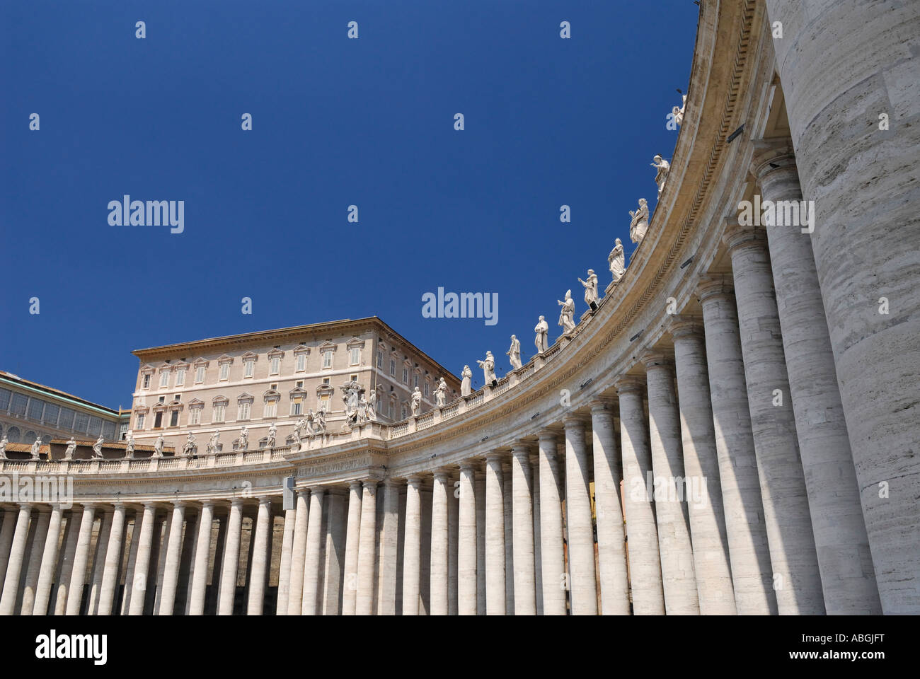 Curve of colonnade in St Peters Square Rome Italy with rows of pillars ...
