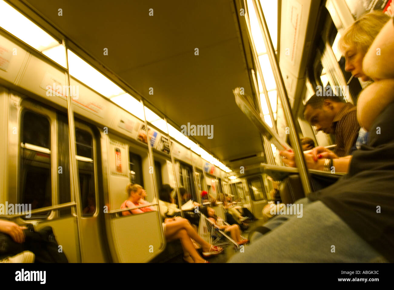Passengers sitting inside a subway train in Boston Massachusetts USA ...