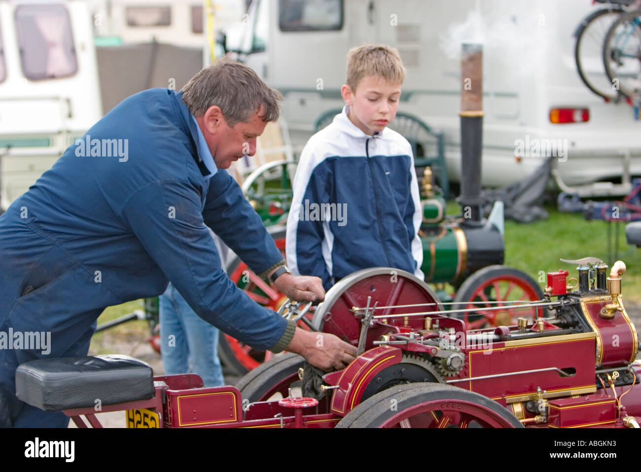 Mechanic maintains vintage miniature steam traction engine Stock Photo ...
