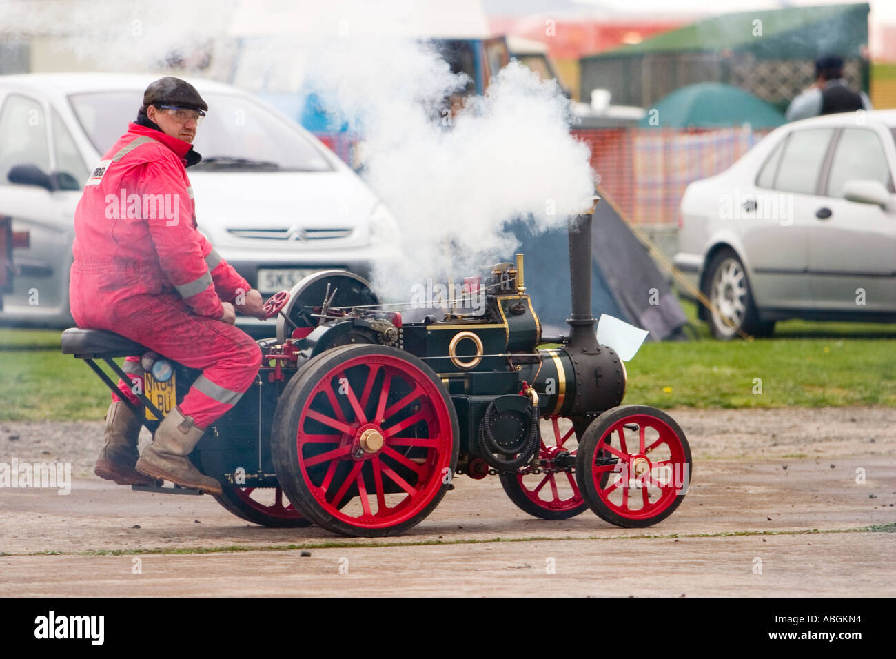 Man driving Burrell 4" SCC Road Loco miniature steam traction engine ...