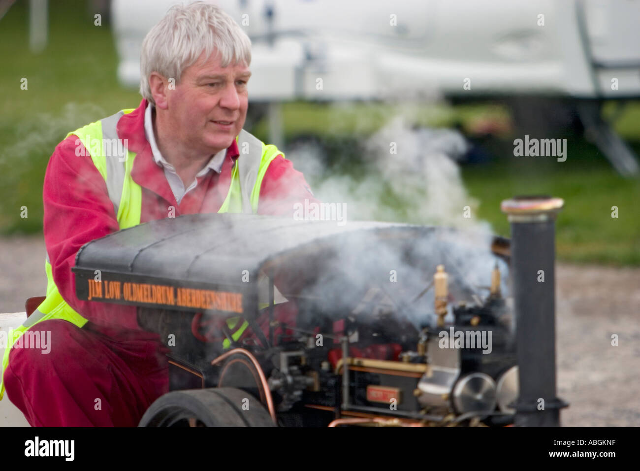 Man driving 3" Fowler R3 Road Loco miniature steam traction engine ...