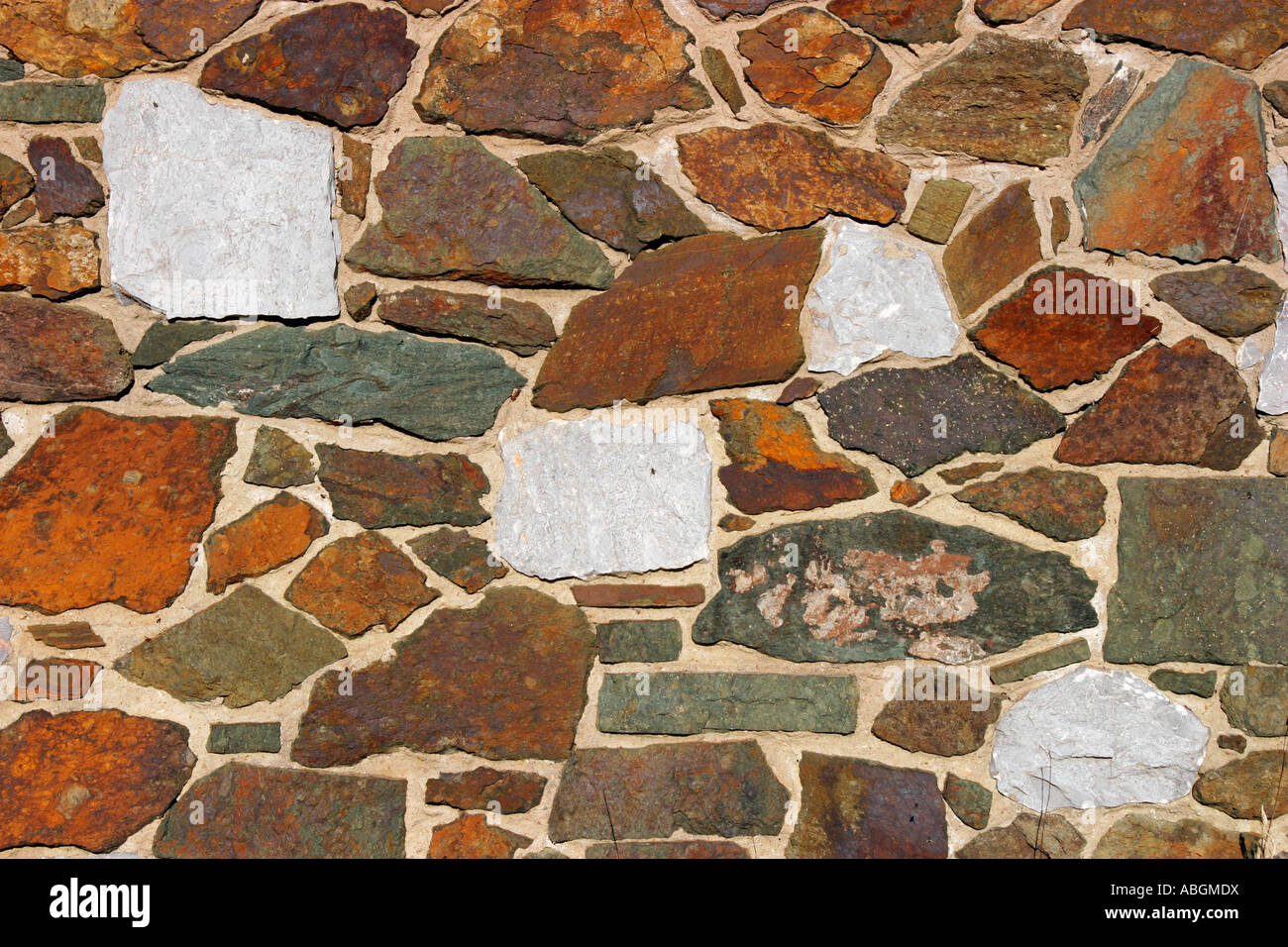 Patterned natural stone wall Stock Photo - Alamy