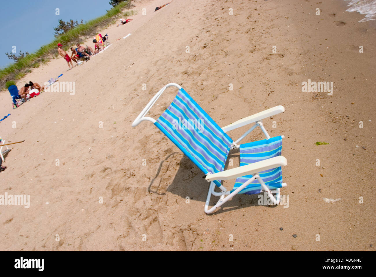 Empty folding chair at a beach in Connecticut USA Stock Photo - Alamy