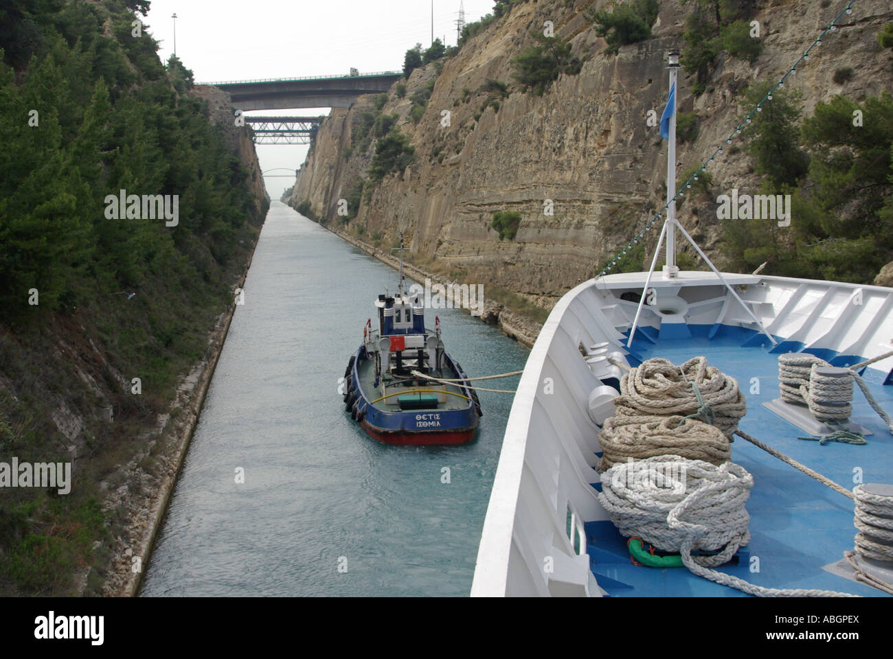 Greece Corinth Canal cruise ship passing through assisted by tug Stock ...