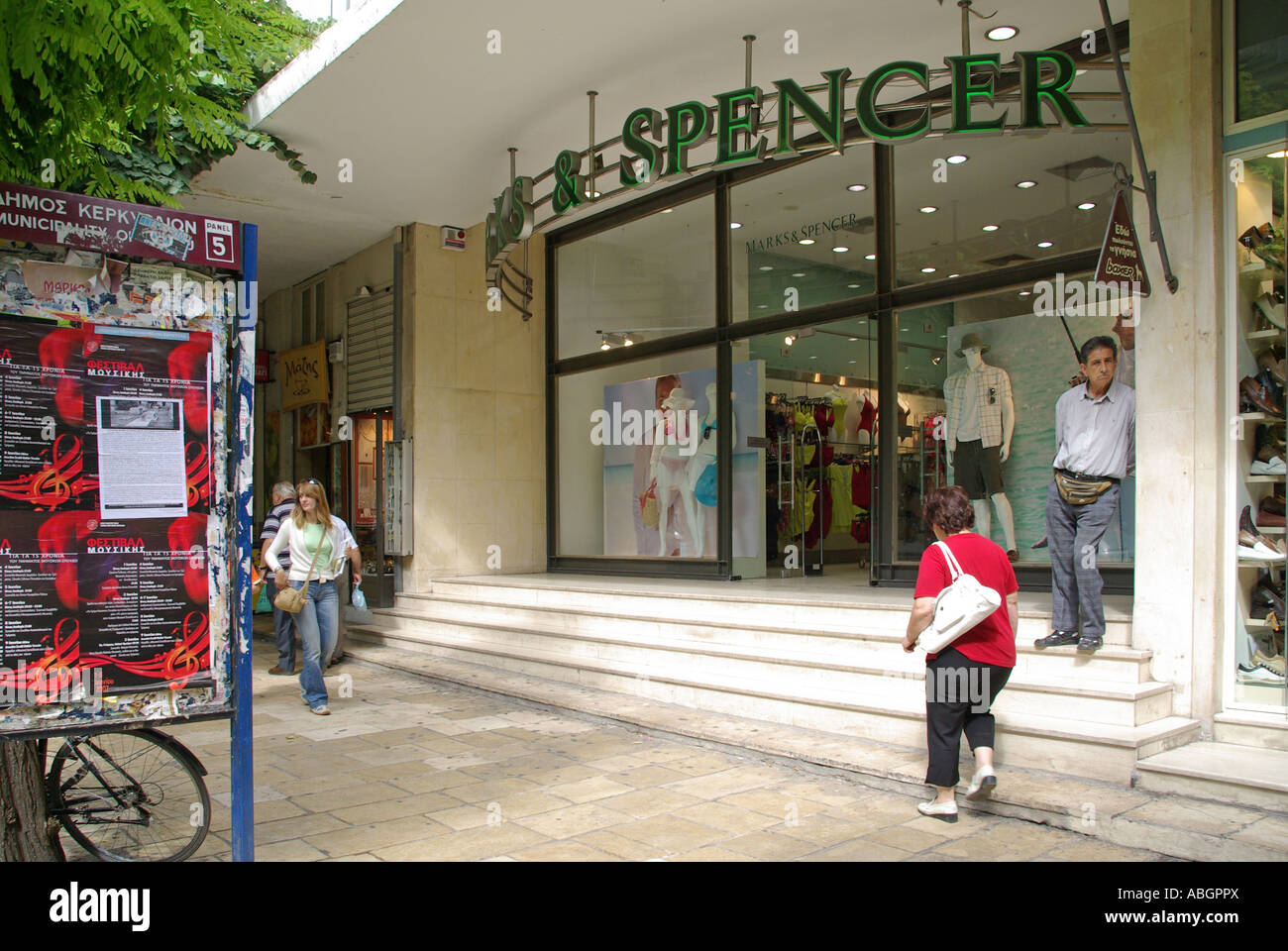 Street Scene in Corfu Town on the Greek island of Corfu shop front ...