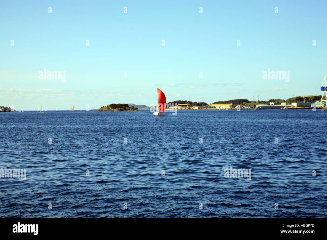 Red sailed sailing dingy, Satvanger, Norway Stock Photo - Alamy