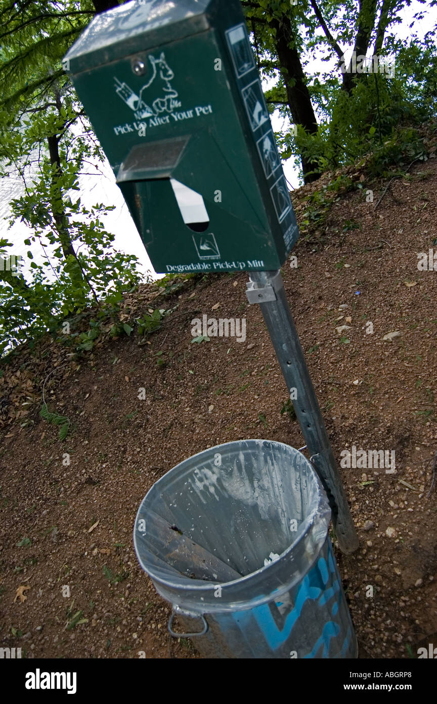 Doggy poop center on walking trail Stock Photo - Alamy