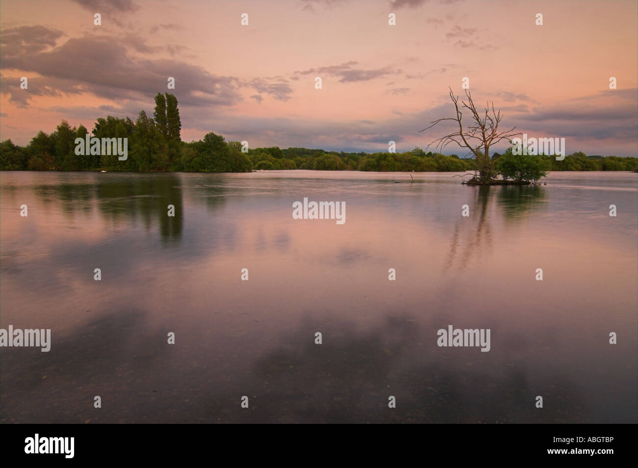 Sunset over reclaimed gravel pits Attenborough nature reserve ...