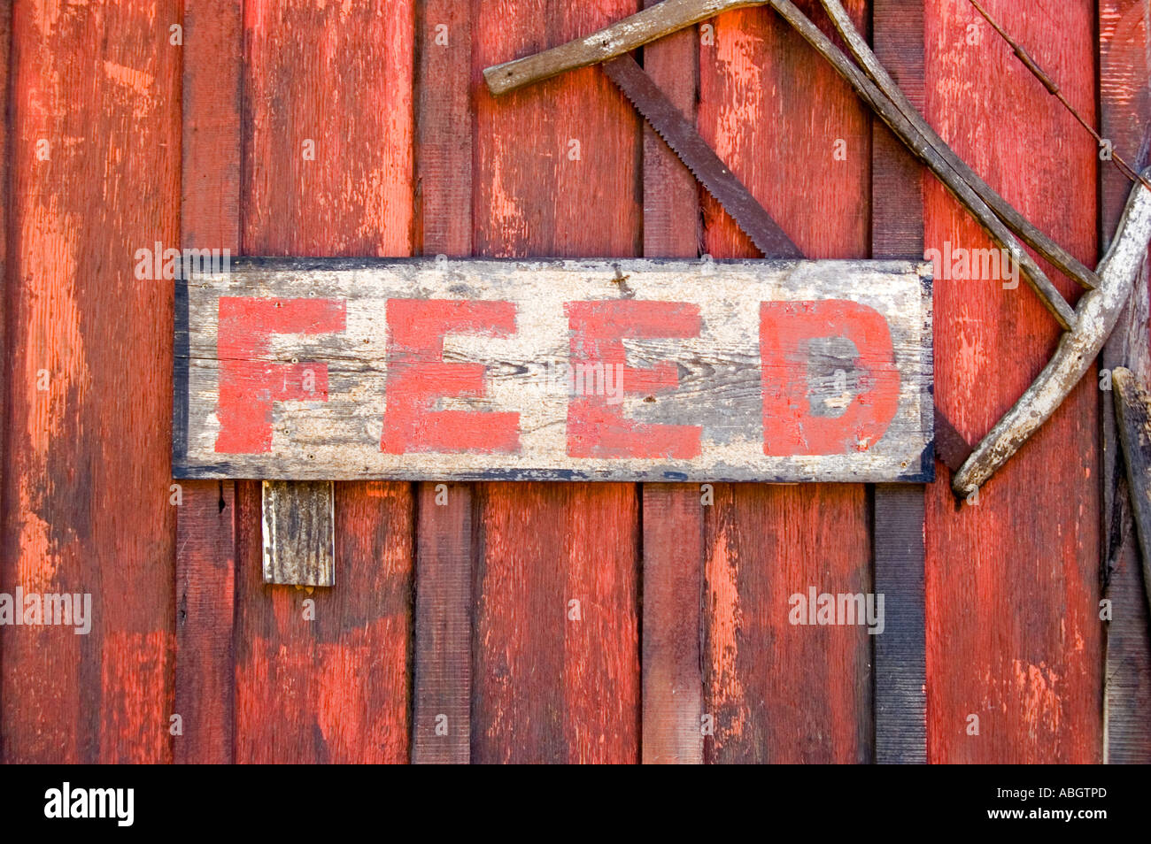 Rustic feed sign Stock Photo - Alamy