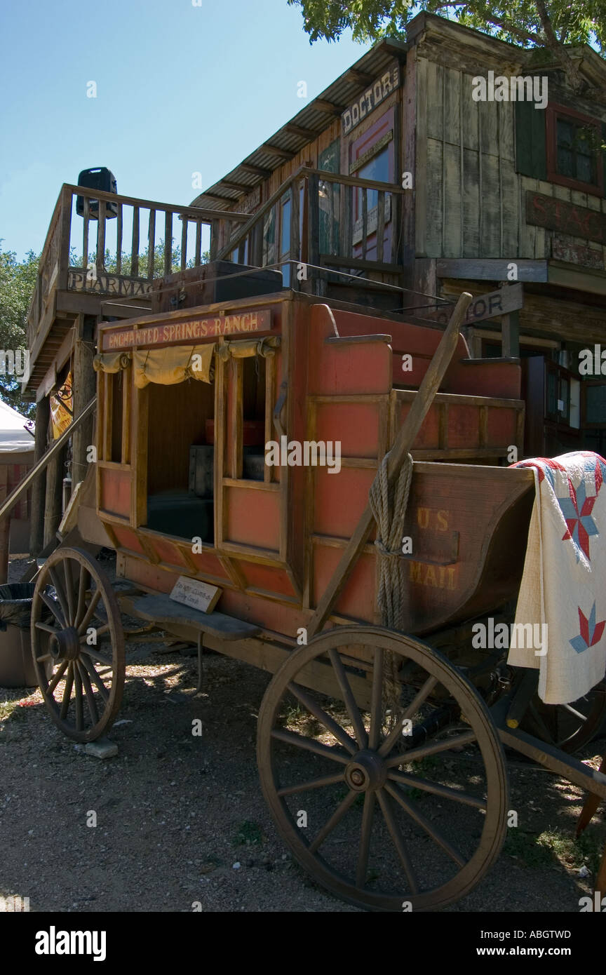 Vintage stagecoach in front of old cowboy building Stock Photo - Alamy
