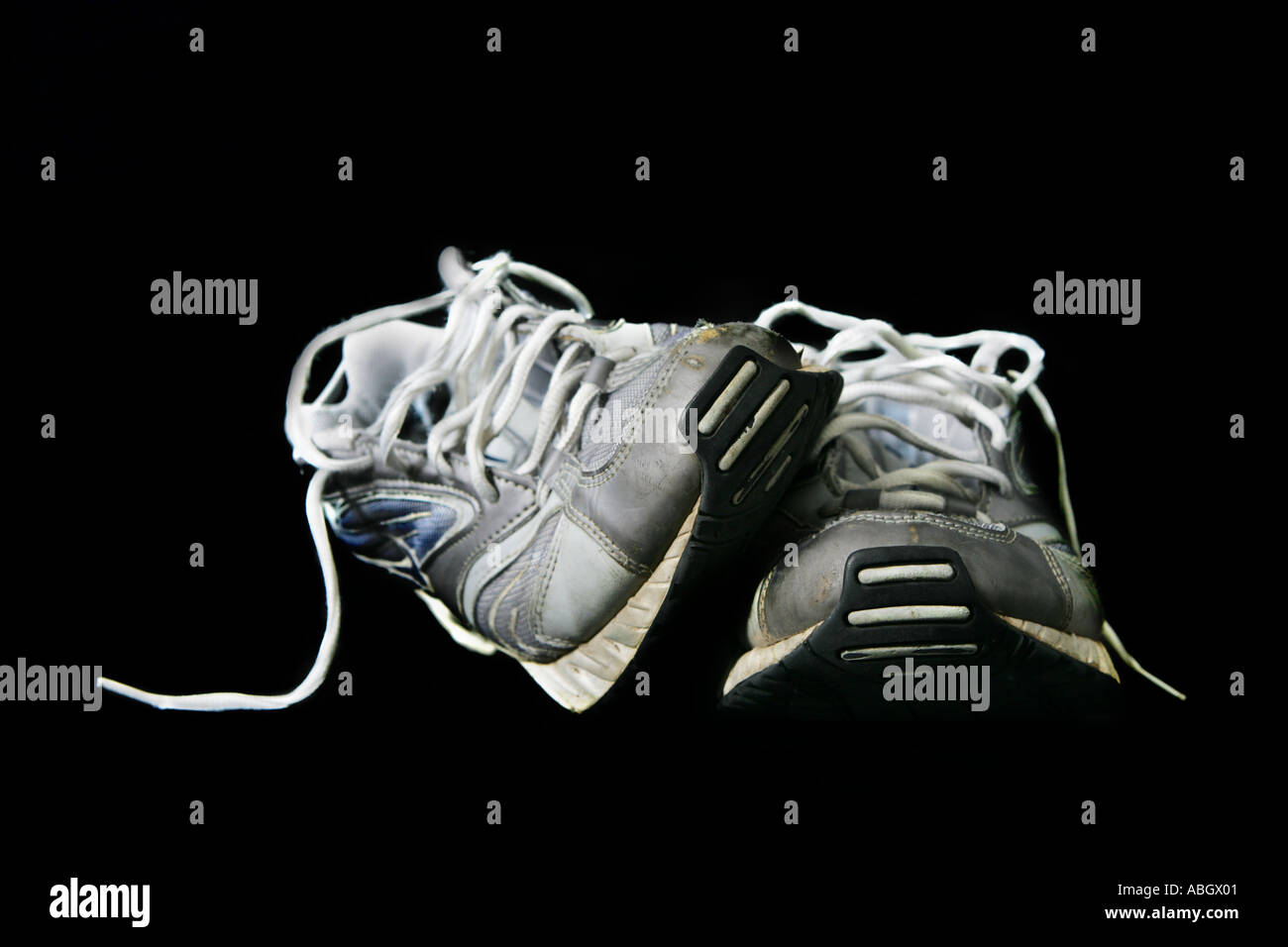 Worn out trainers Stock Photo - Alamy