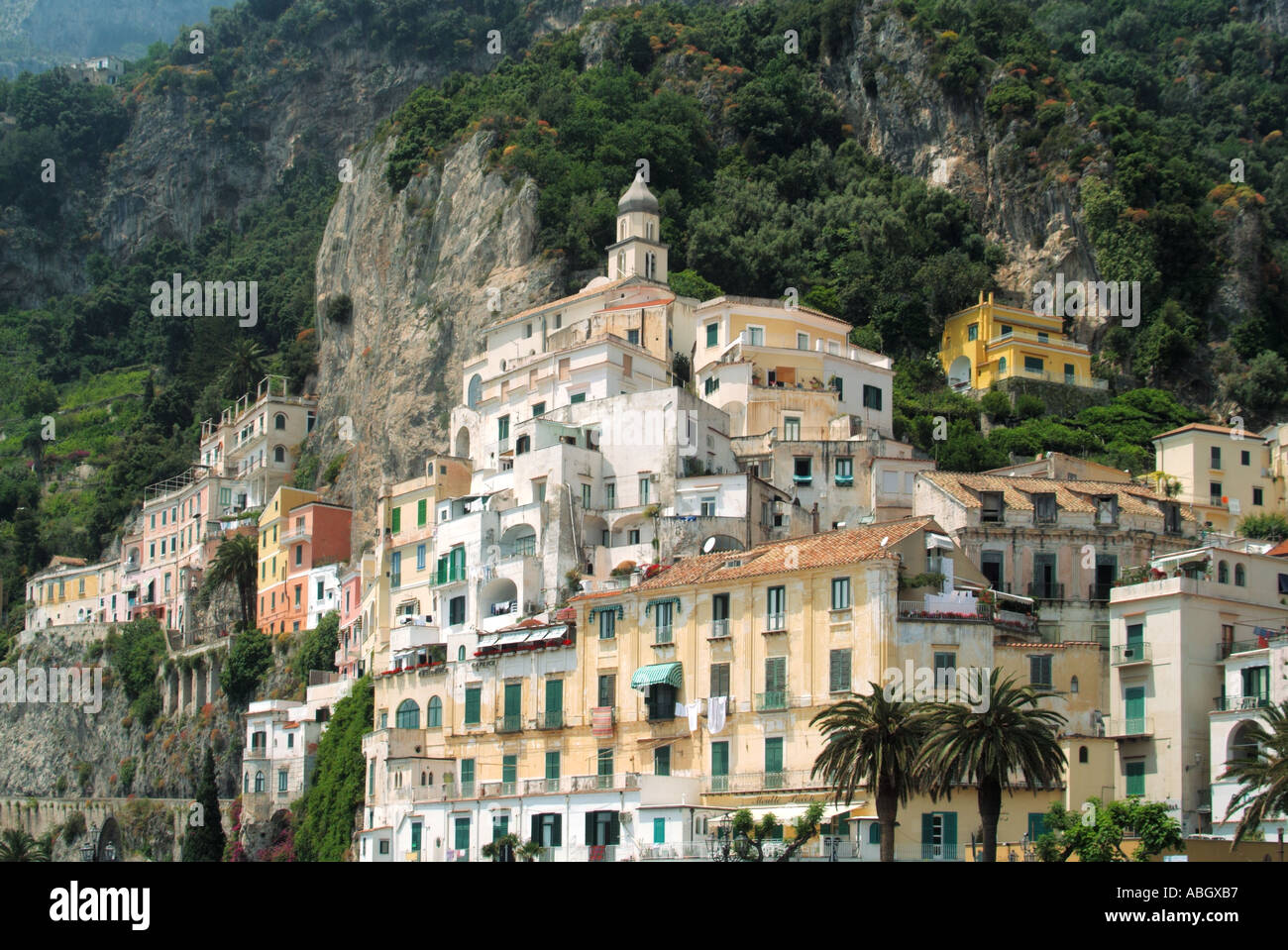 Close up of typical Amalfi town buildings with backdrop of rocky ...