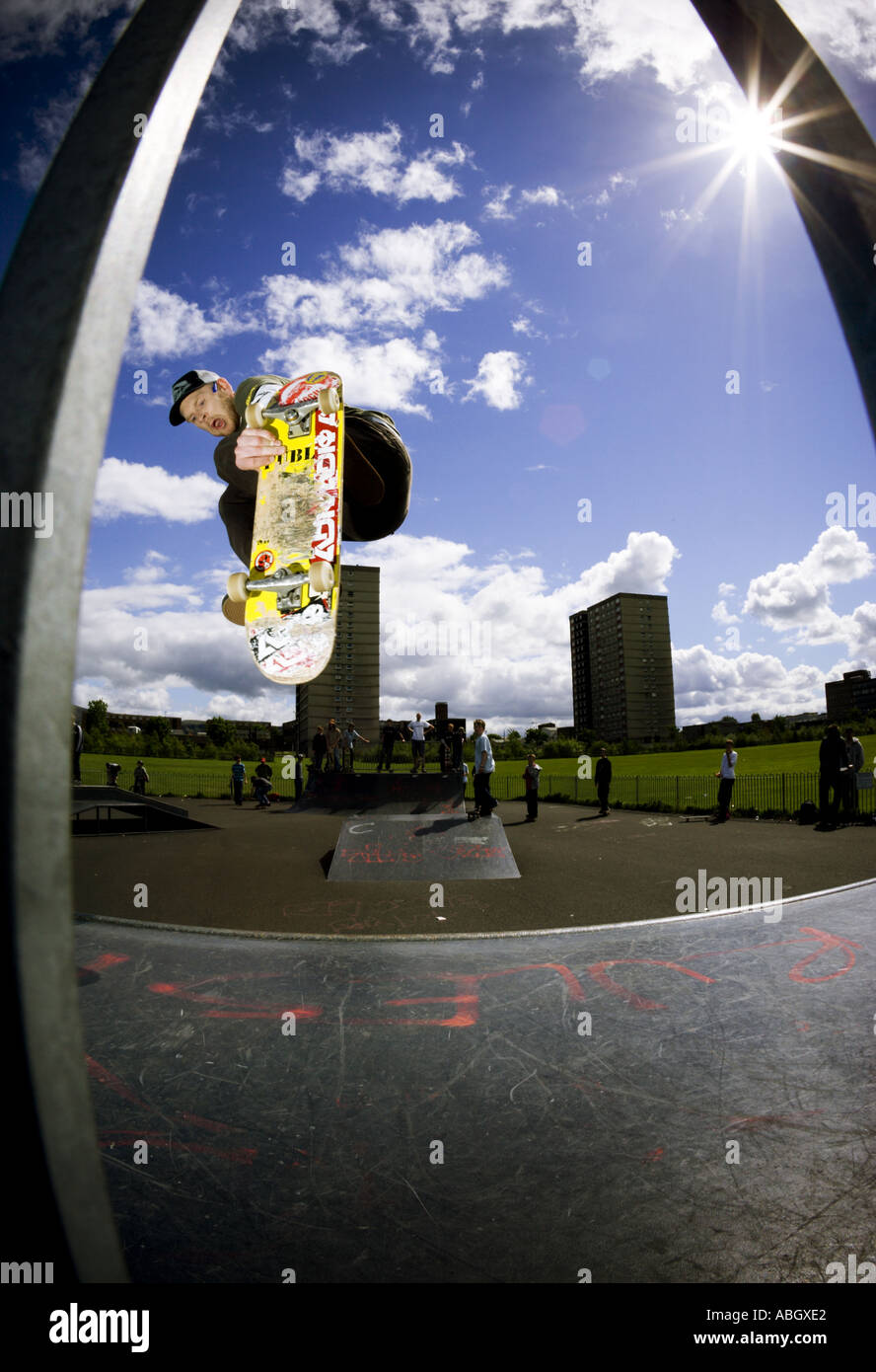 Skateboarder shot through metal bars Stock Photo - Alamy