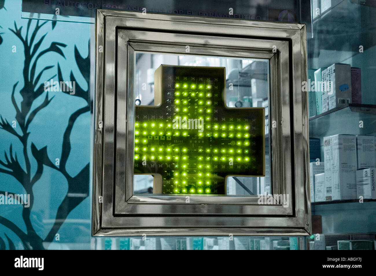 Pharmacy neon green cross sign hi-res stock photography and images - Alamy