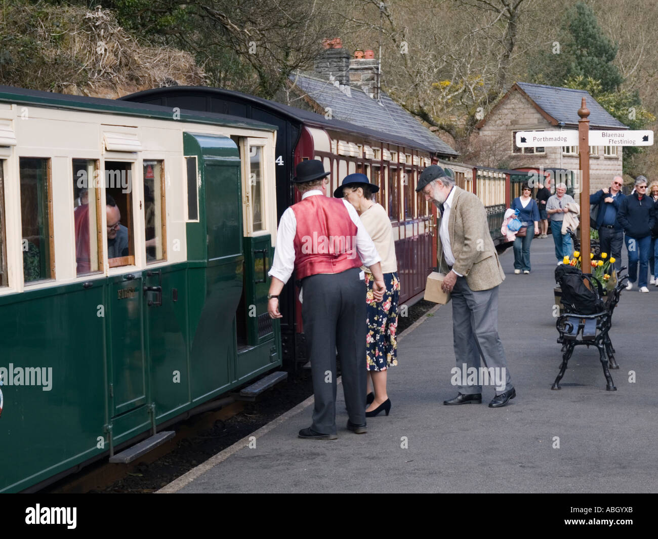 Passengers boarding restored old train carriages in Tan-y-Bwlch station on heritage narrow gauge ...
