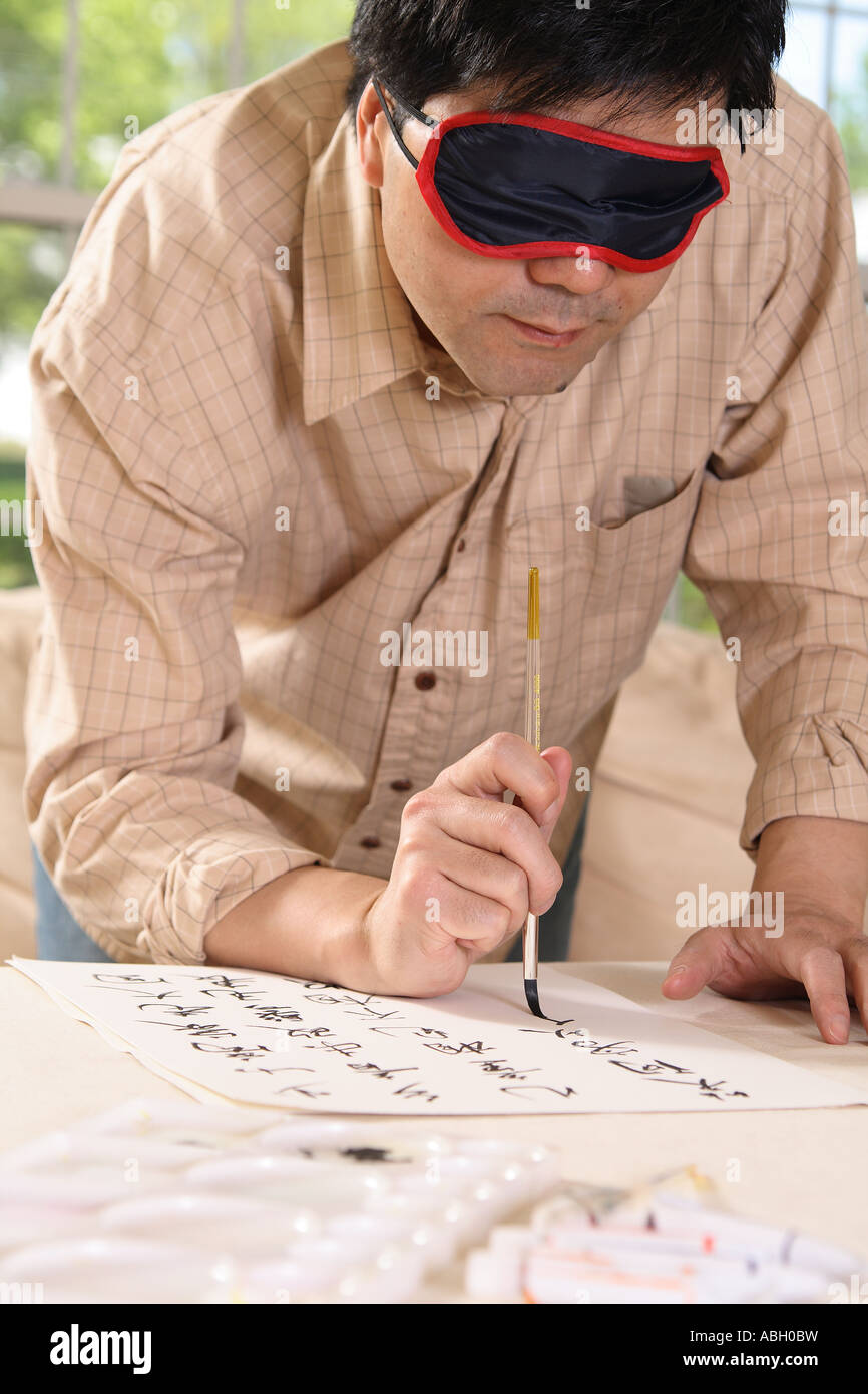 asian man writing chinese calligraphy Stock Photo - Alamy