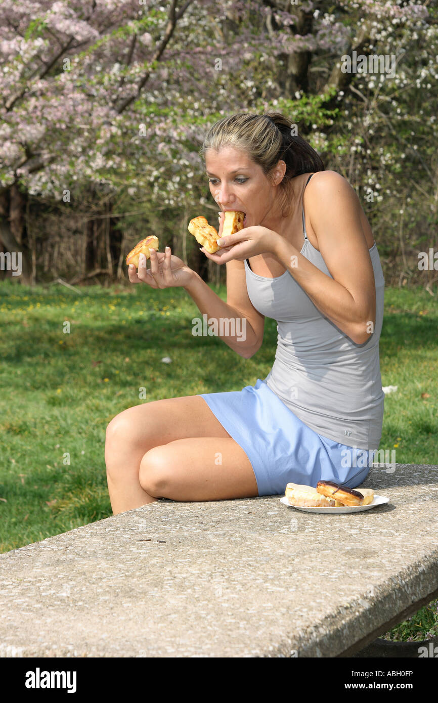 Woman binge eating hi-res stock photography and images - Alamy
